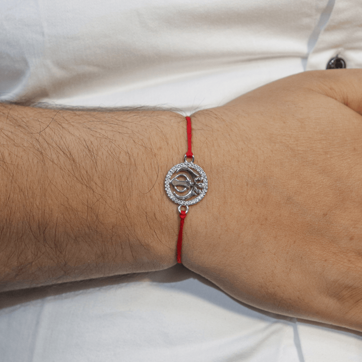 Zarkan Khanda ☬ Precious Silver Rakhi With Roli Chawal